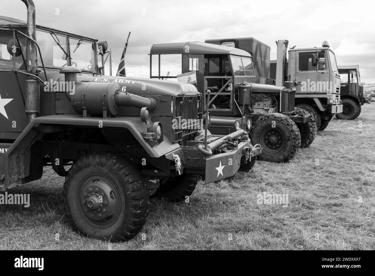 Low Ham.Somerset.United Kingdom.July 23rd 2023.A row of military trucks ...