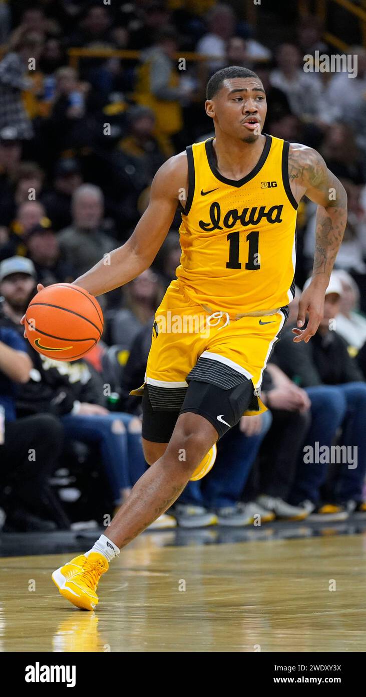 Iowa guard Tony Perkins (11) drives up court during the second half of ...