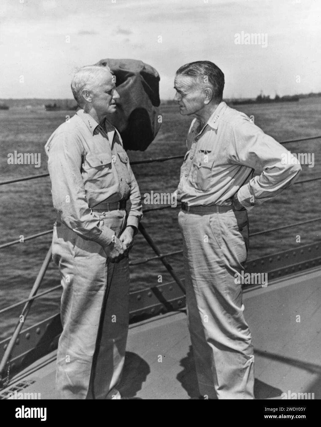 Adm. Chester W. Nimitz and Adm. William F. Halsey aboard USS Curtiss ...