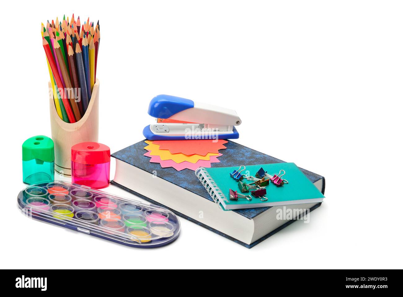 Book and stationery set isolated on a white background. Free space for ...