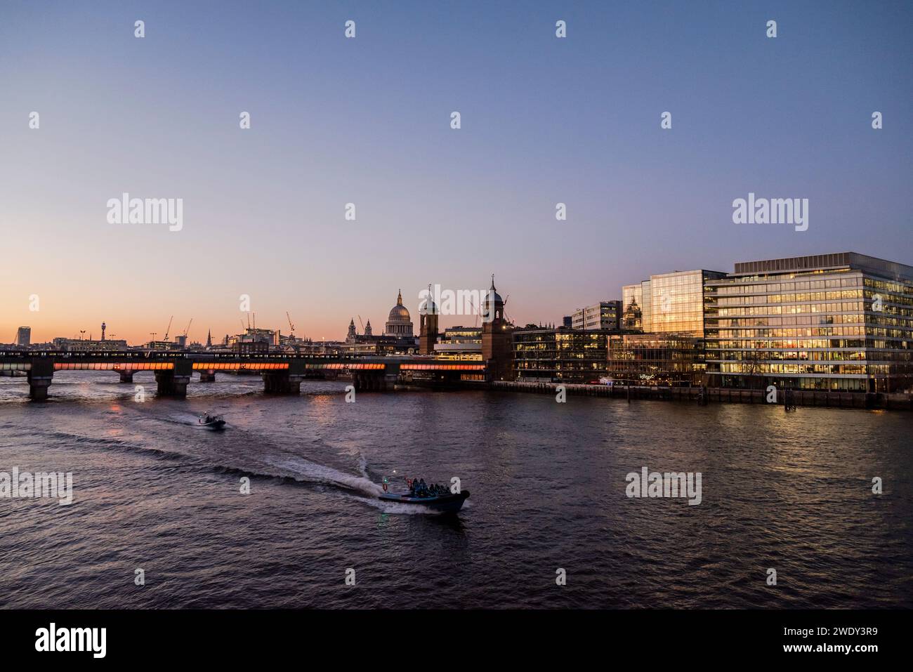 Cannon Street railway bridge illuminated at night, London, England, UK ...