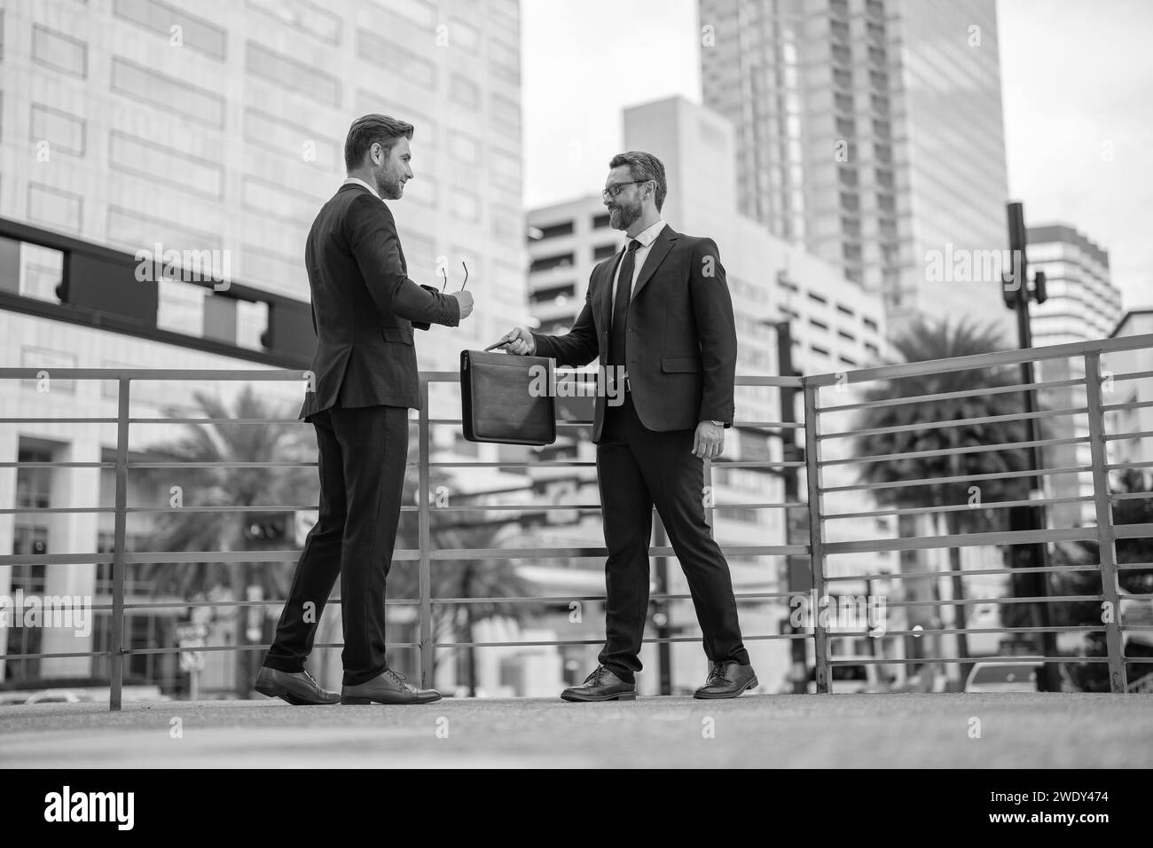 successful business leader boss men hold briefcase. successful business ...