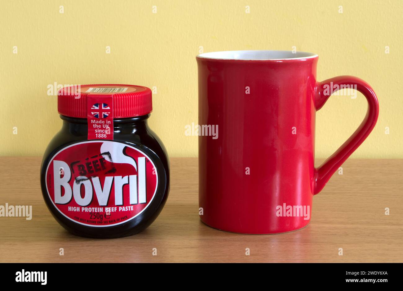 Jar of Beef Bovril With A Mug Stock Photo - Alamy