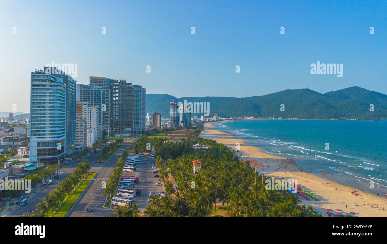 Aerial sunset view of Da Nang coastline. My Khe beach seafront with ...