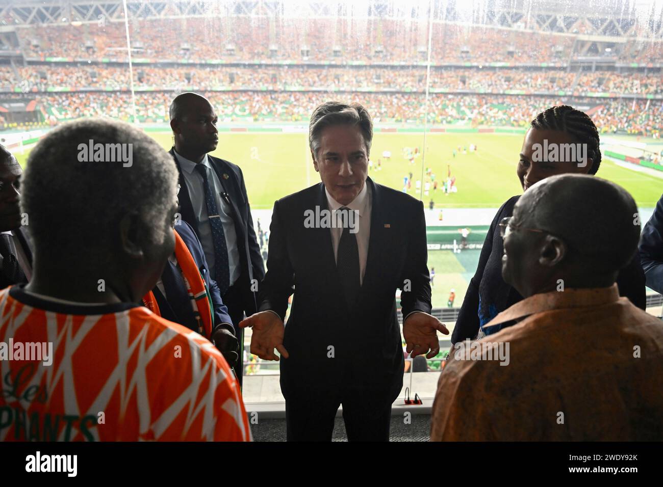US Secretary of State Antony Blinken, center, speaks to US Ambassador ...