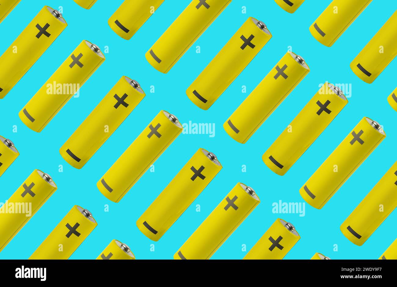 Yellow battery, lithium cylinders pattern background Stock Photo - Alamy