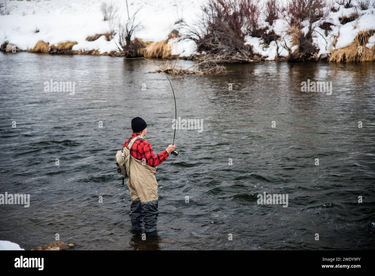 Winter fly fishing in the dark and icy waters of the Provo River, Provo ...