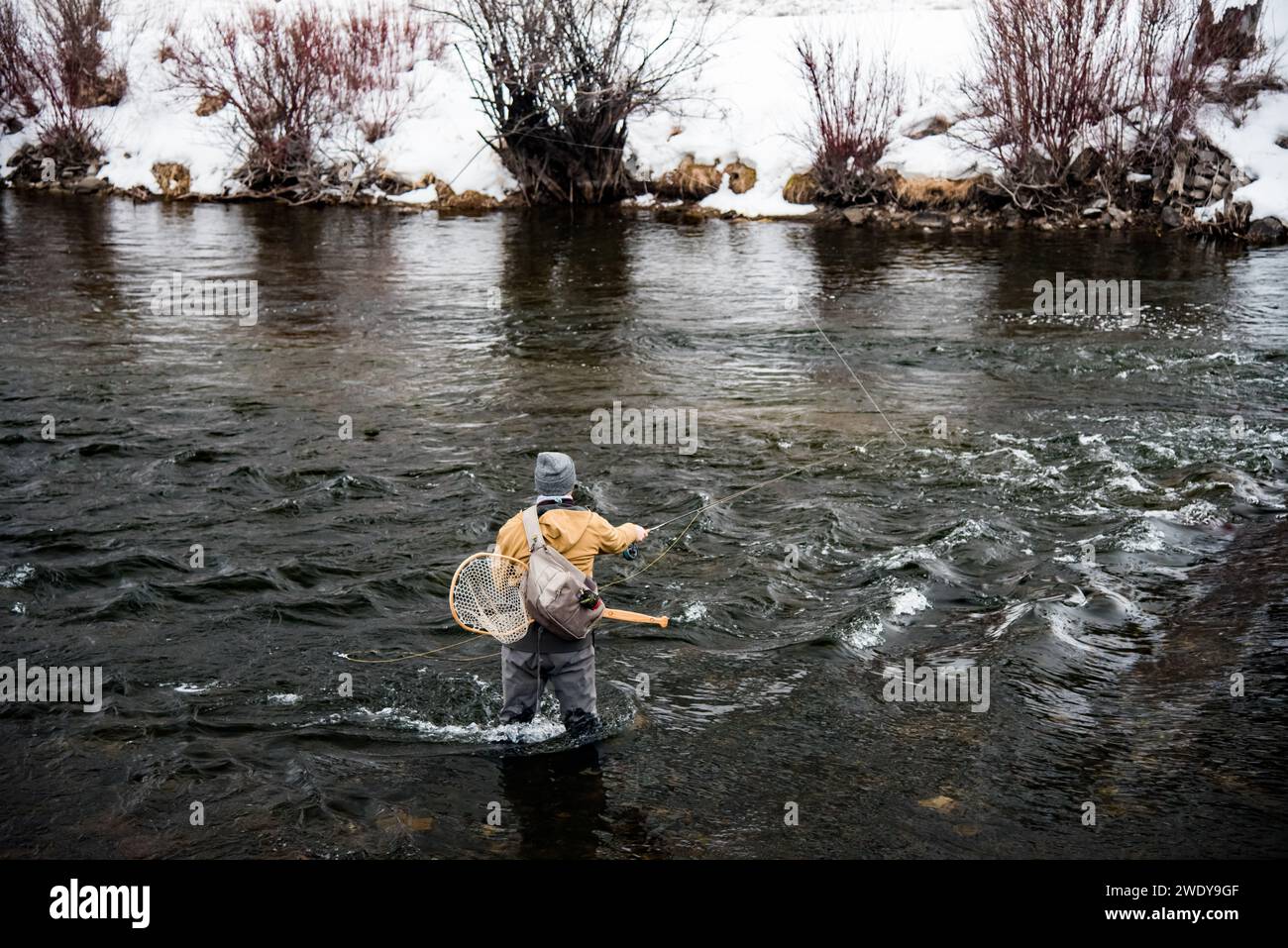 Winter fly fishing in the dark and icy waters of the Provo River, Provo ...