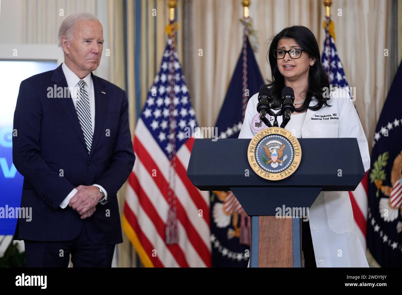 President Joe Biden looks on as Dr. Tani Malhotra, M.D., Maternal-Fetal ...