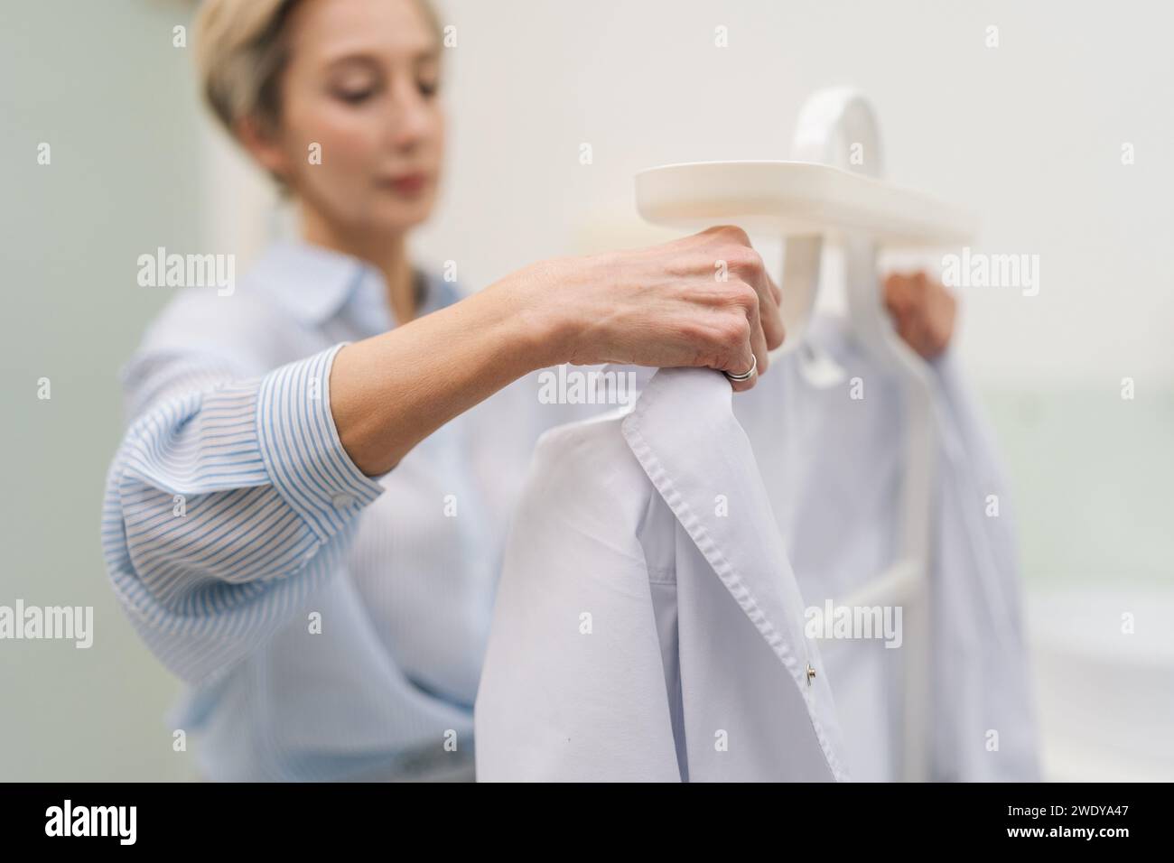 Portrait attractive woman puts off hi-res stock photography and images ...