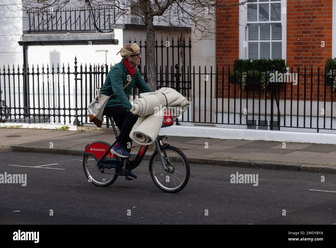 Cyclist carrying heavy load hi-res stock photography and images - Alamy