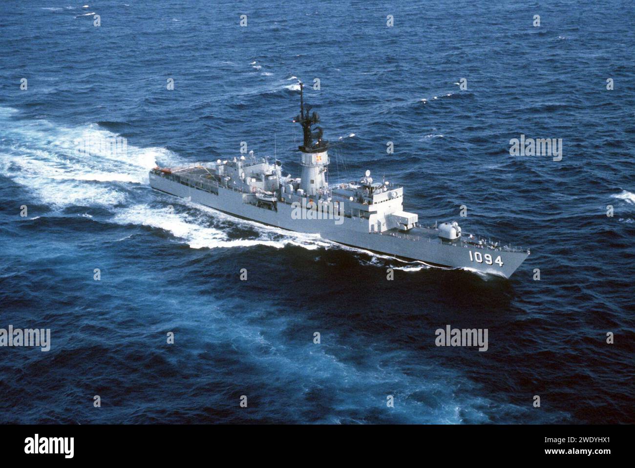 Aerial starboard bow view of USS Pharris (FF-1094) underway during ...