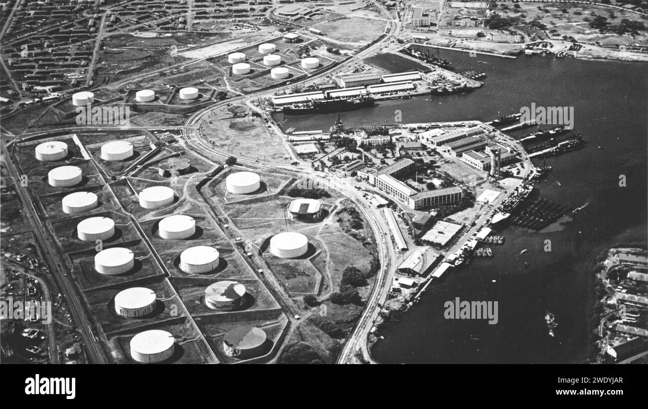 Aerial view of the Pearl Harbor submarine base and adjacent fuel tank ...