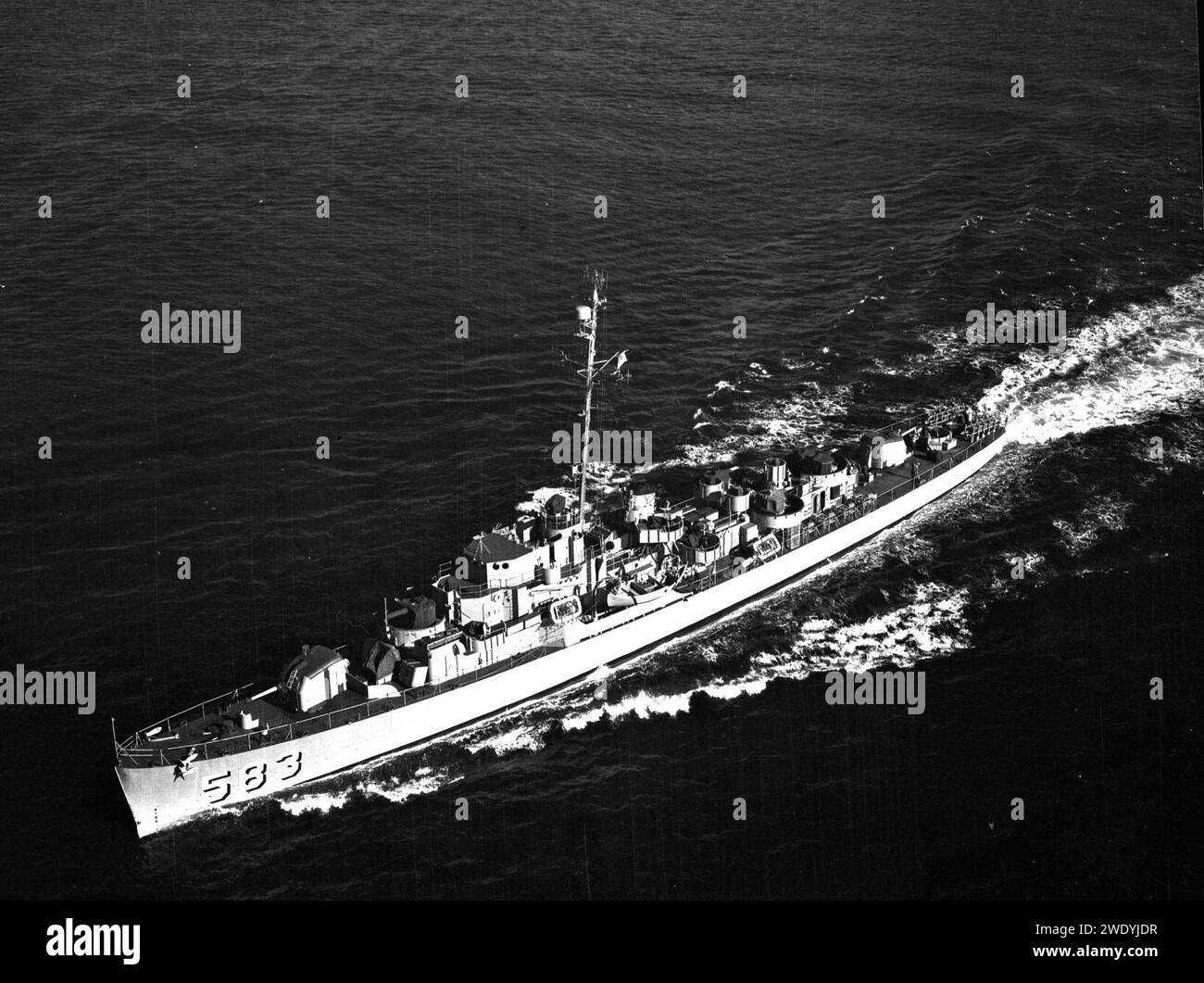 Aerial view of USS George A. Johnson (DE-583) underway at sea, in the ...