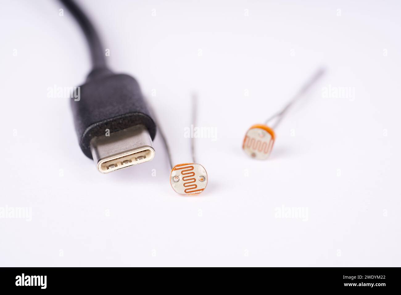 Electronic parts photoresistor and resistor on white background Stock ...