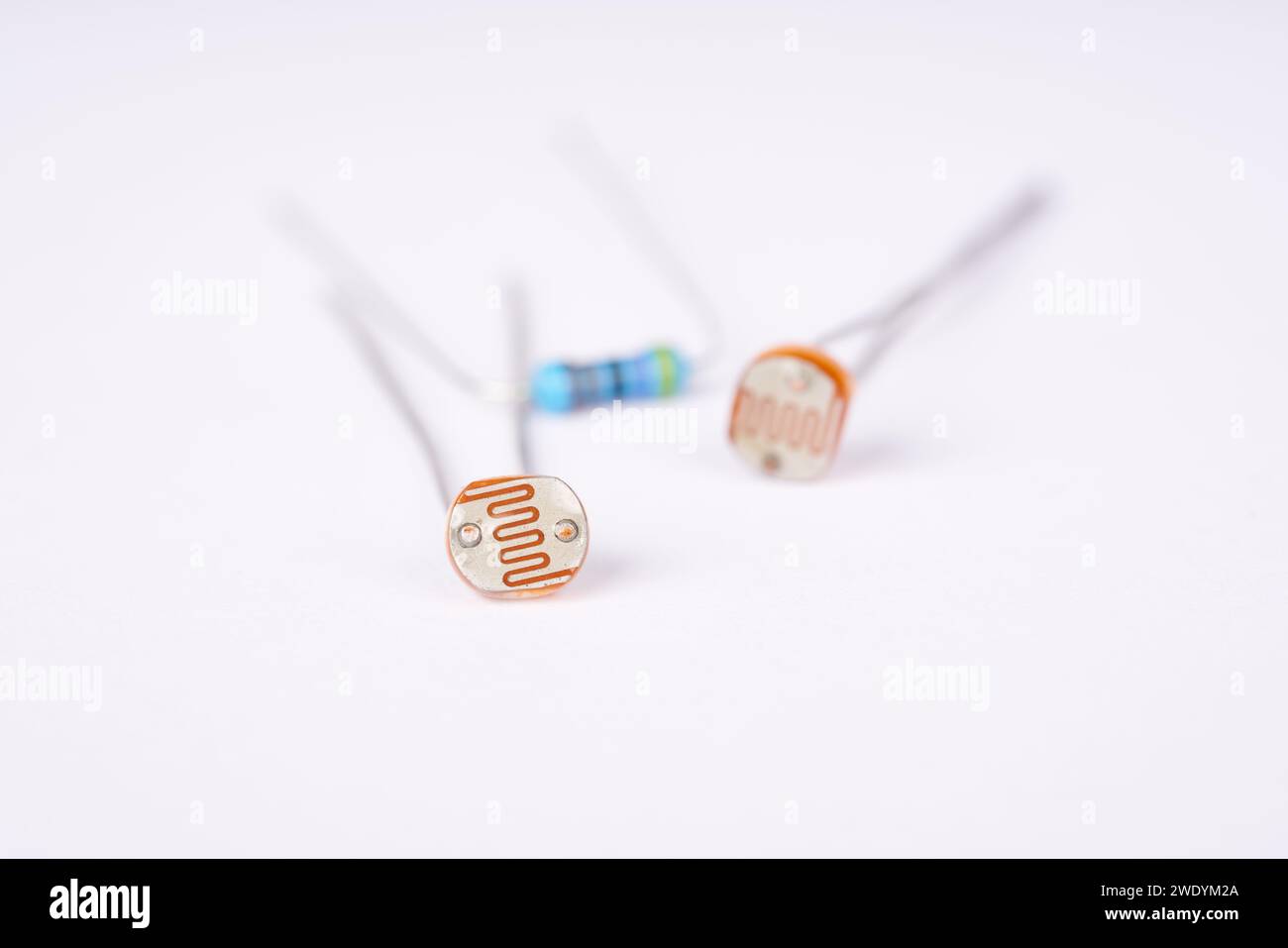 Electronic parts photoresistor and resistor on white background Stock ...