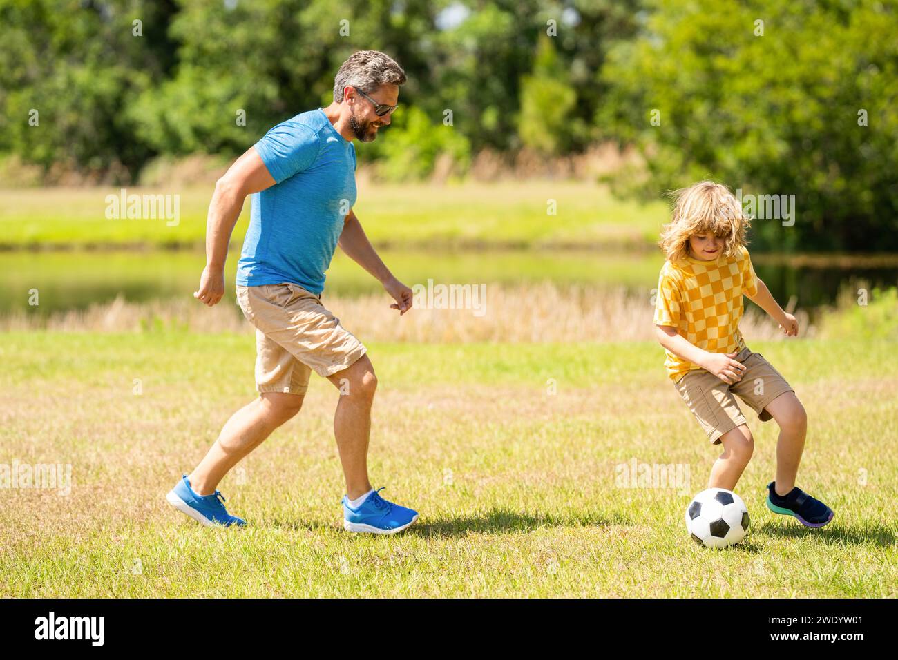 Father dad and son enjoying outdoor activities together. Outdoor ...