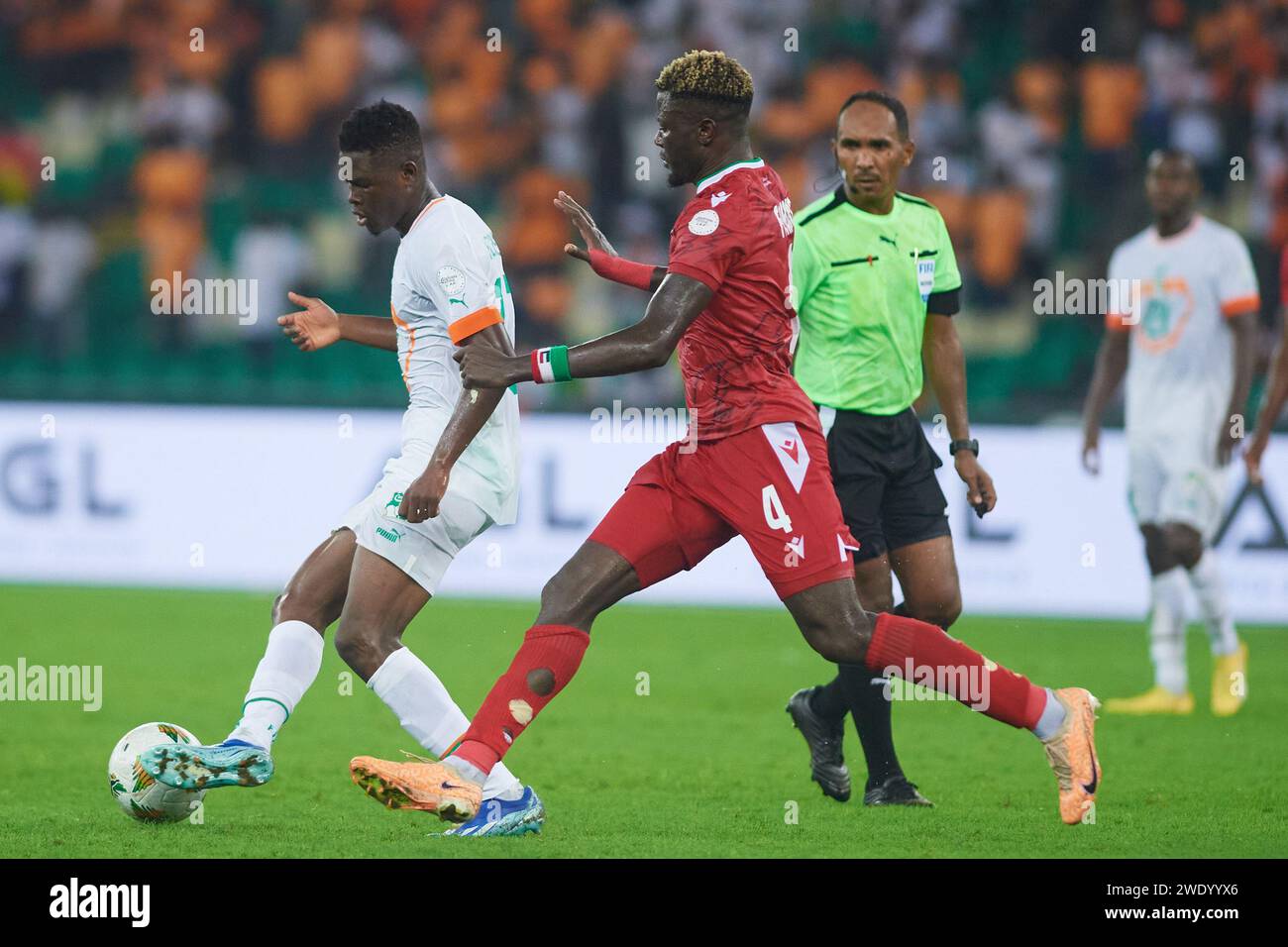 Karim Konaté under pressure from Equatorial Guinean Federico Bikoro ...