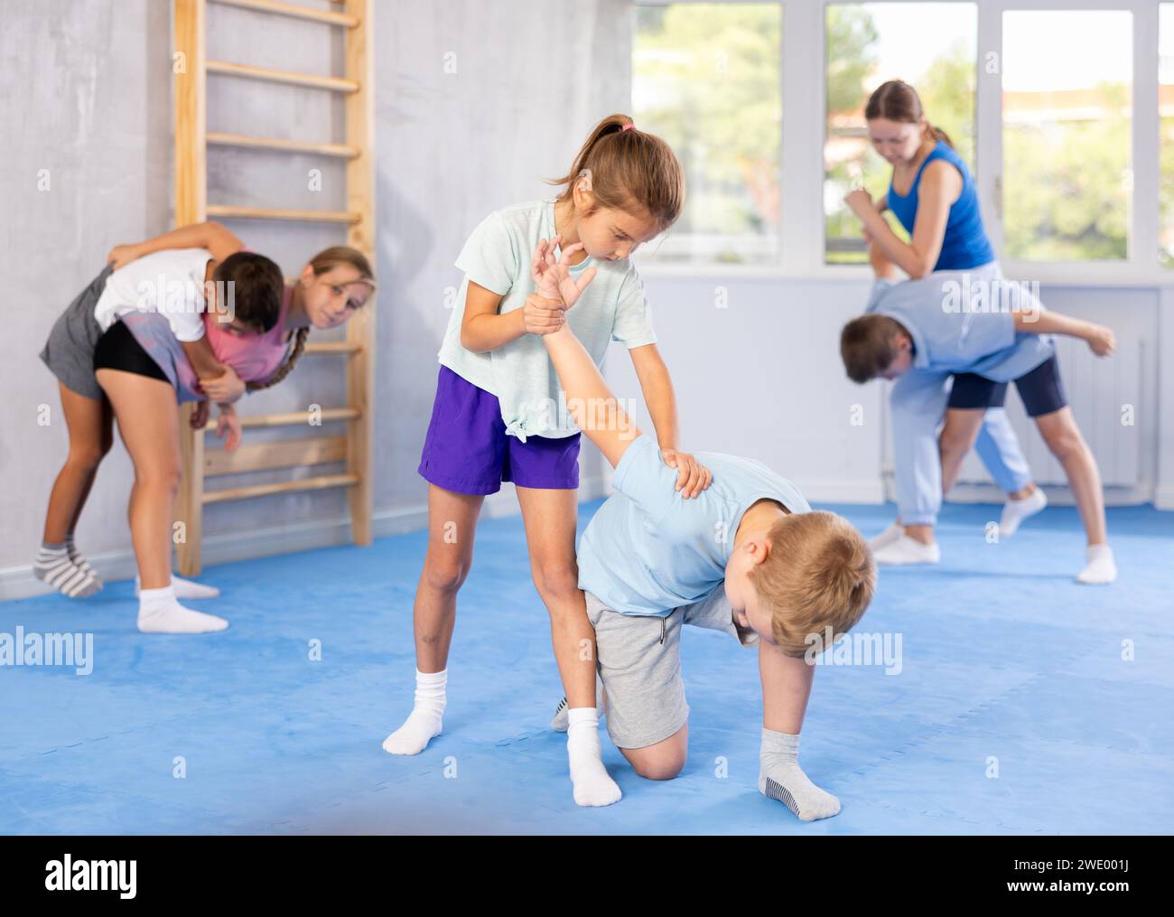 practice grabbing their opponent's arms Stock Photo - Alamy