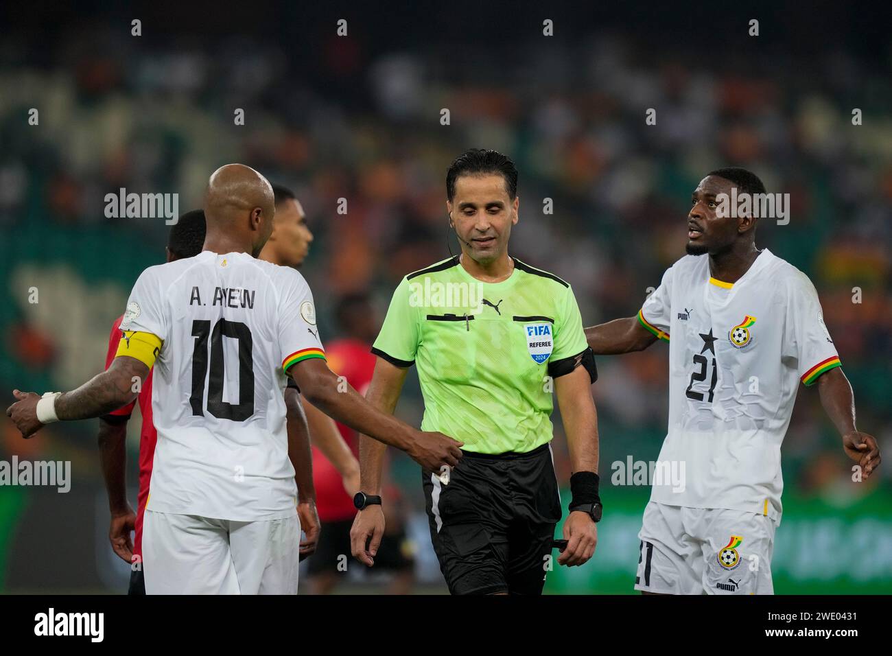 Ghana's Andre Ayew, left, and Ghana's Salis Abdul Samed, right, argue ...