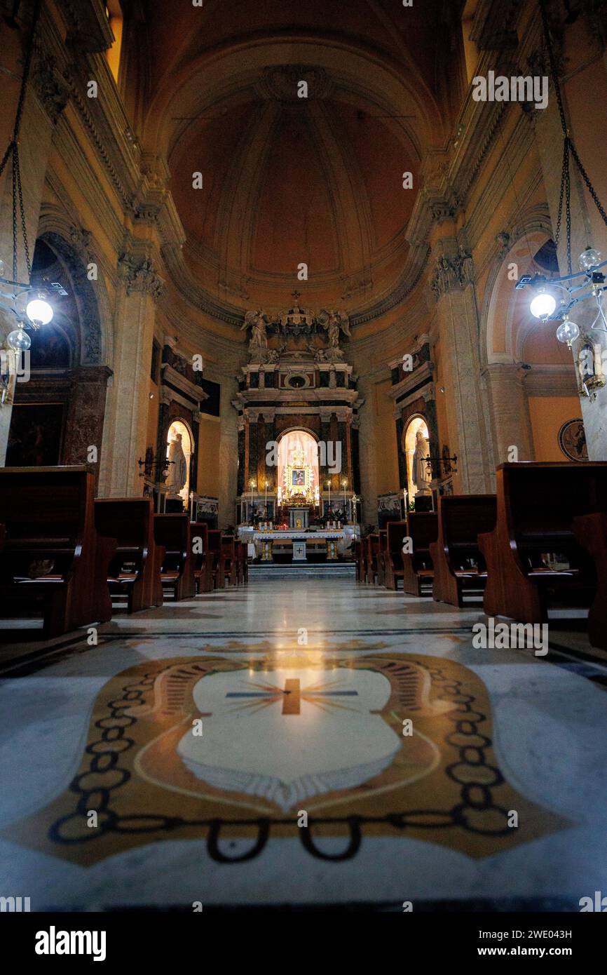 Grand church interior of Santa Maria delle Fornaci in Rome with ornate ...