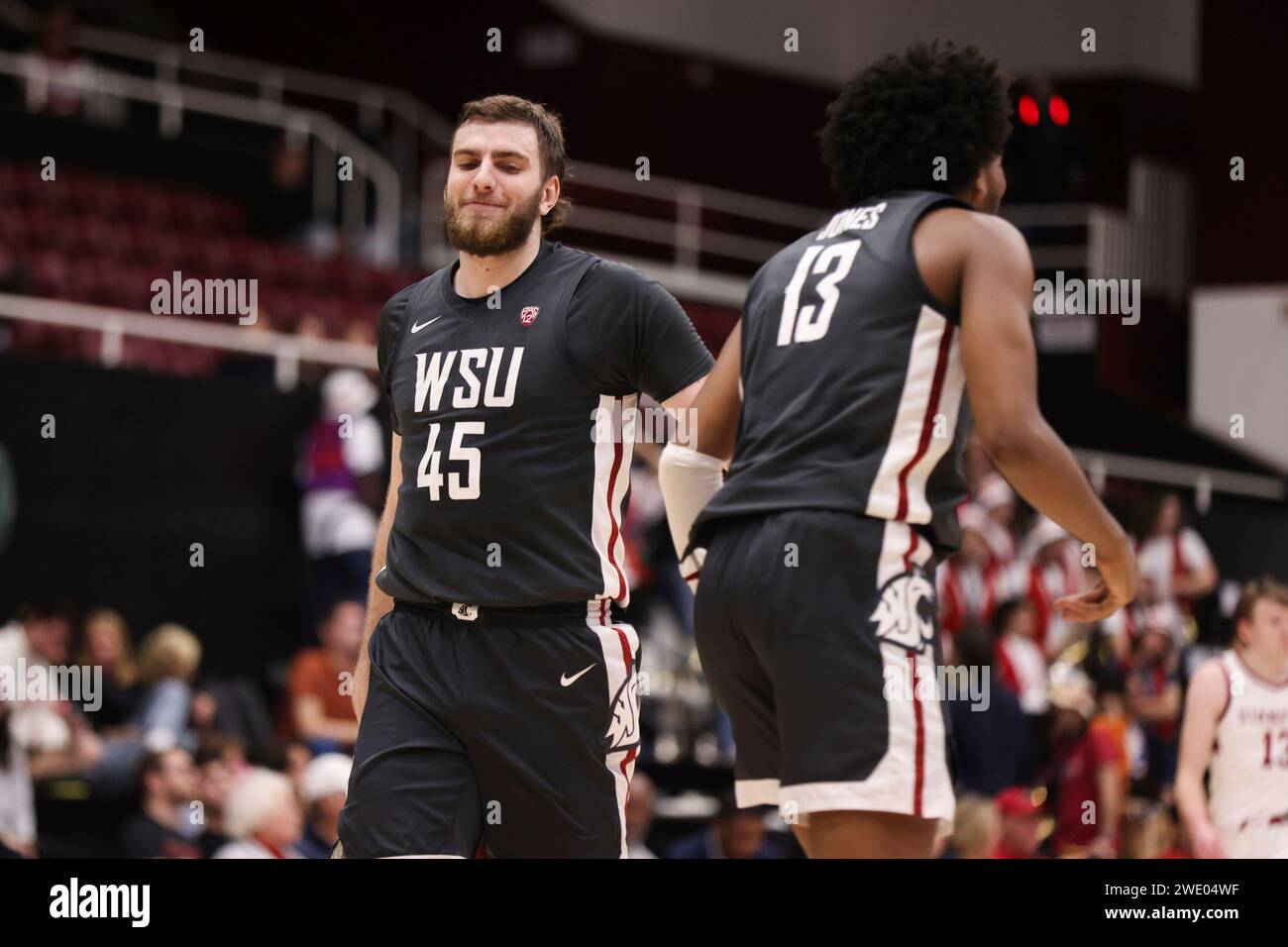 Washington State center Oscar Cluff (45) gestures during the second ...