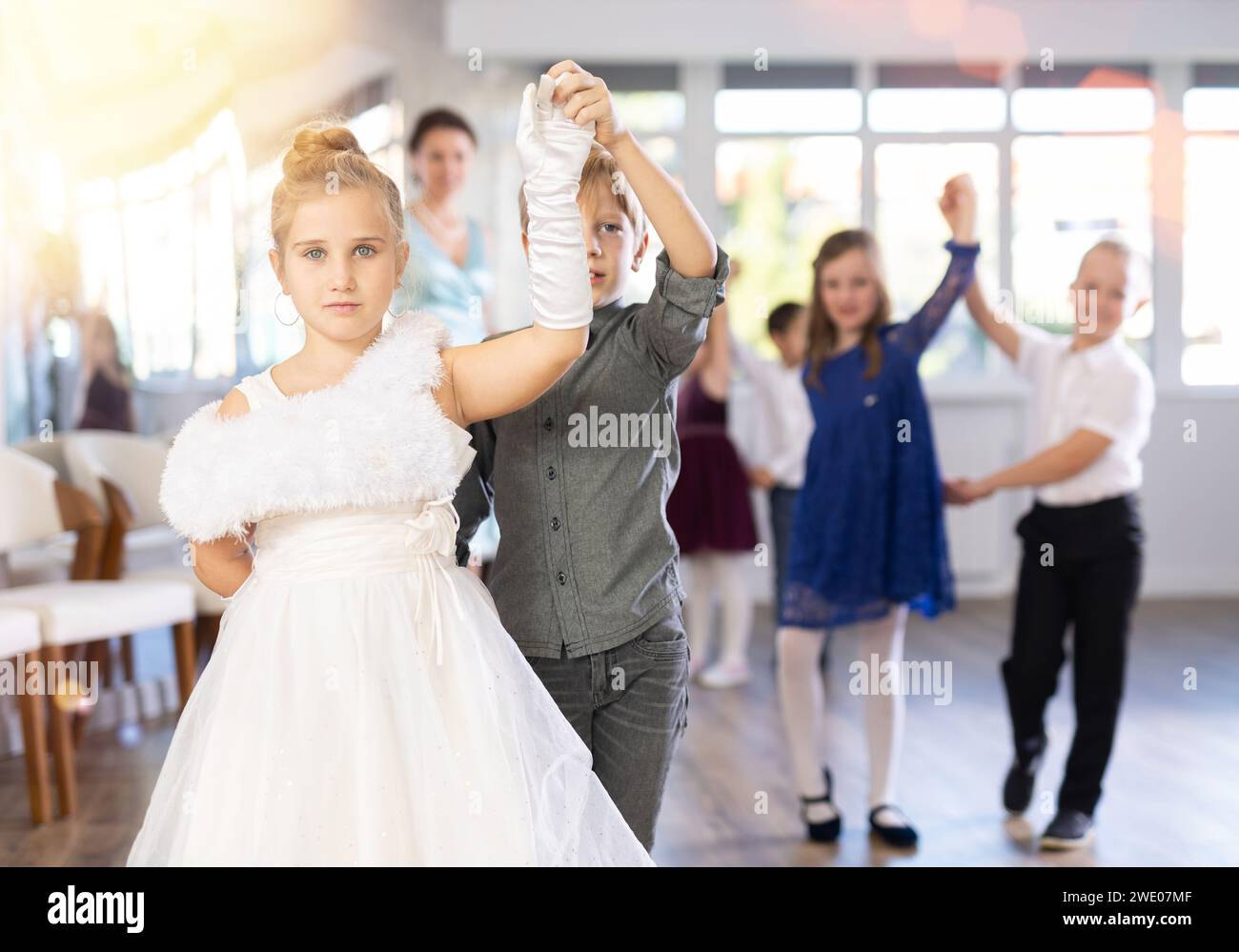 Children dancing together ballroom hi-res stock photography and images ...