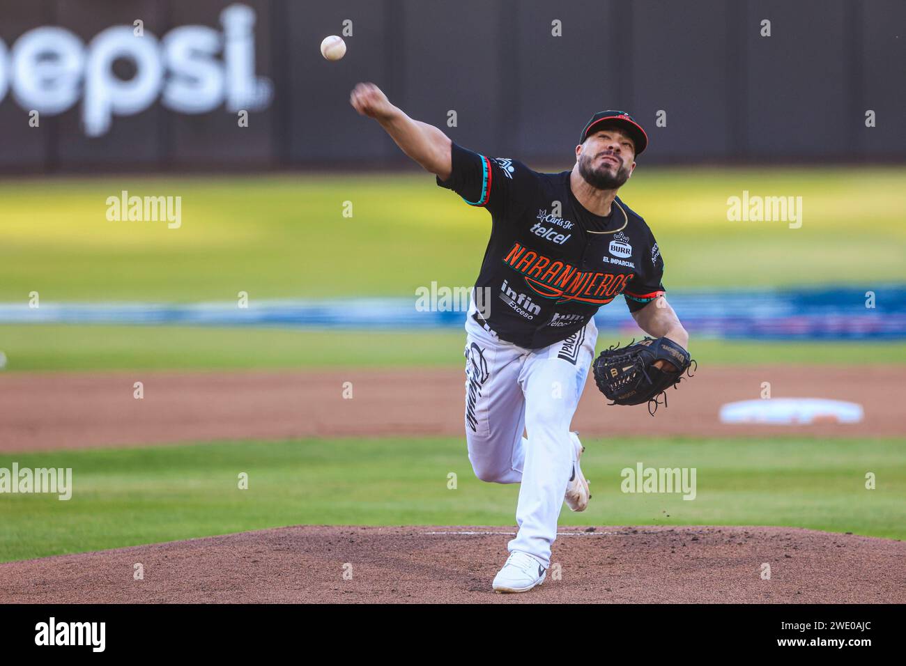 HERMOSILLO, MEXICO - JANUARY 21: Naranjeros starting pitcher Manny Barreda throws the ball in ...