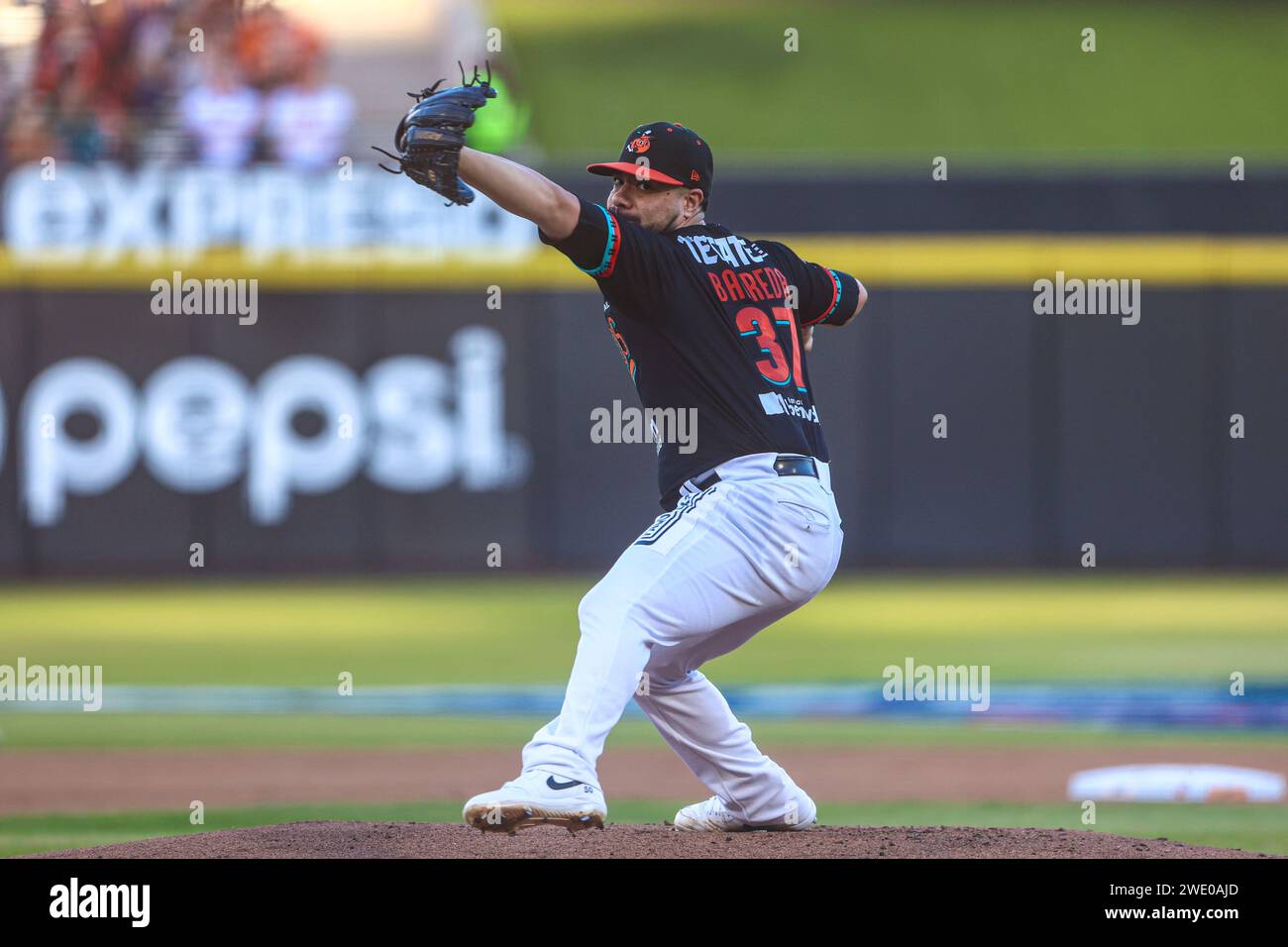 HERMOSILLO, MEXICO - JANUARY 21: Naranjeros starting pitcher Manny Barreda throws the ball in ...