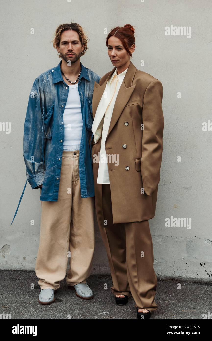 Alice Barbier wears oversized brown suit; Sebastien Roques wears denim ...