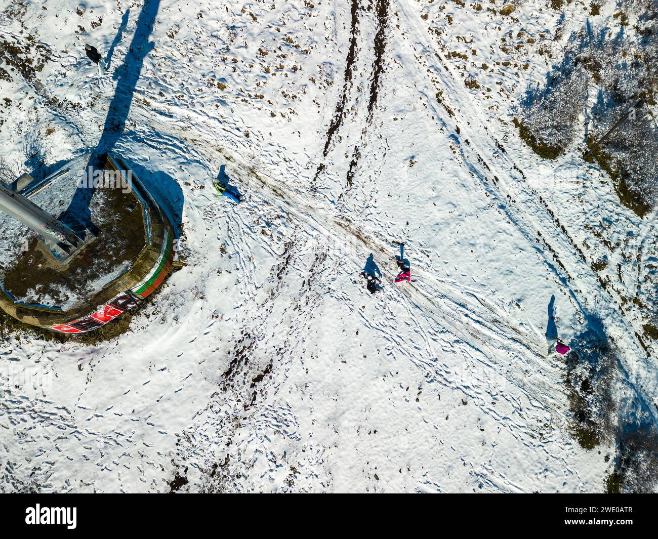 children having fun riding ice slide in winter Burgas,Bulgaria Stock Photo - Alamy