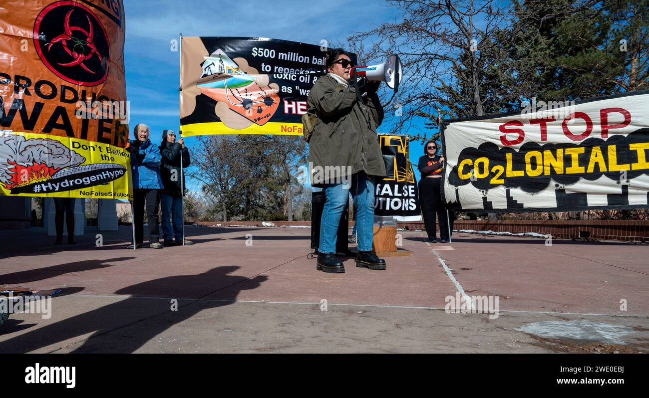 Julia Bernal, with Pueblo Action Alliance, speaks at a protest against ...