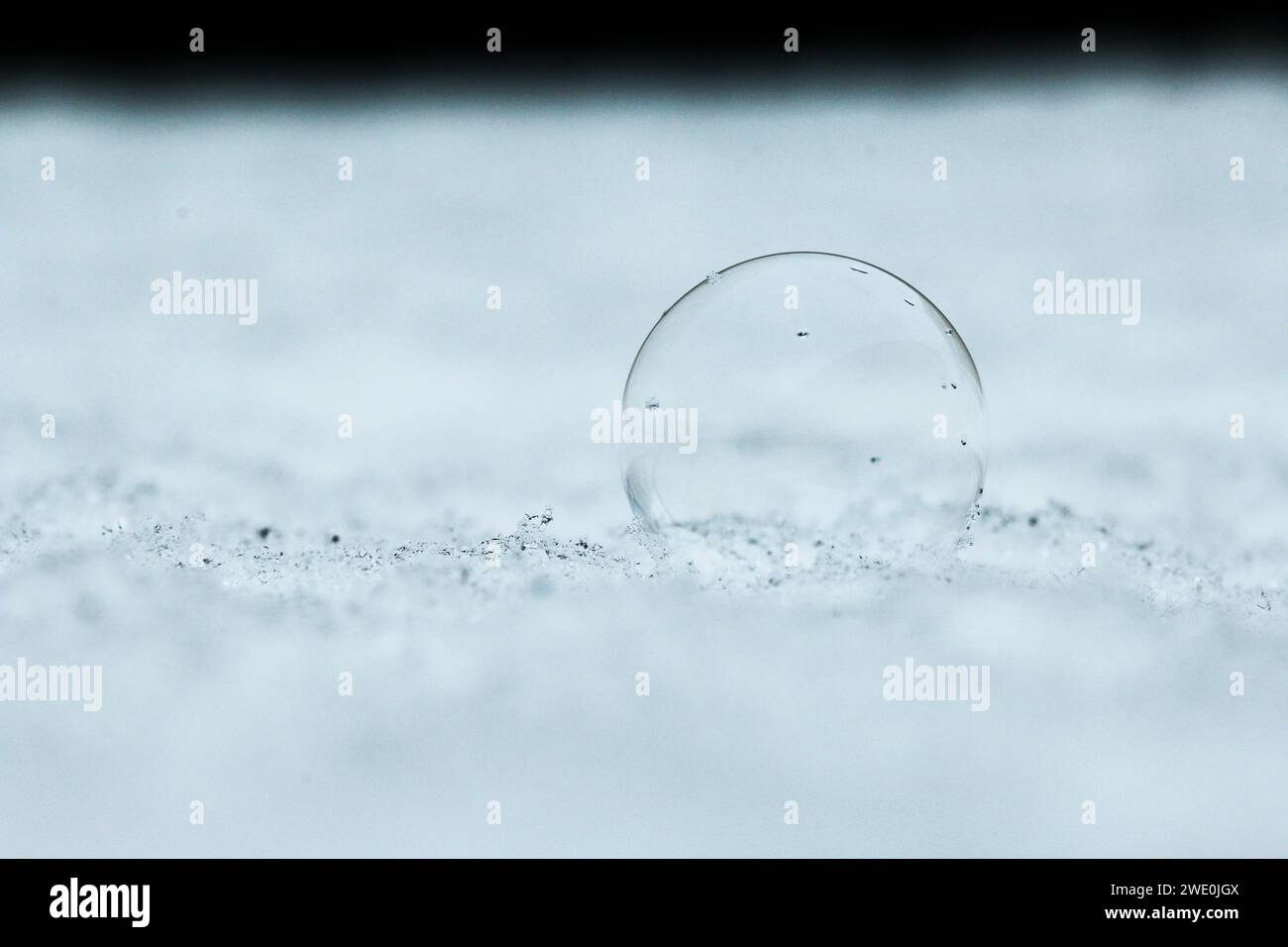 The bubbles in the snow developing the tiniest crystallisation as they ...