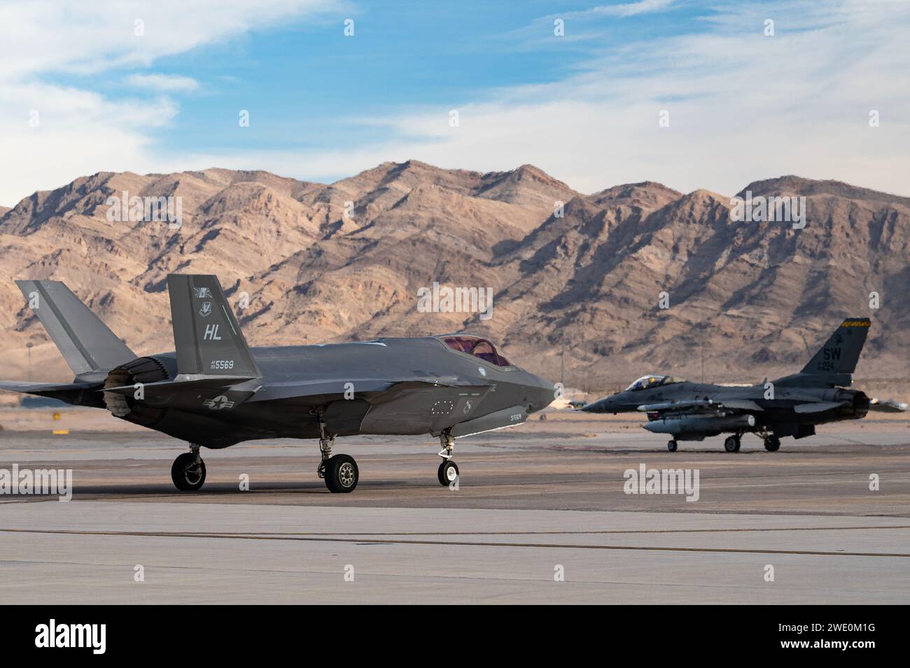 An F-35A, left, assigned to 421st Fighter Squadron, Hill Air Force Base, Utah, prepares to take ...