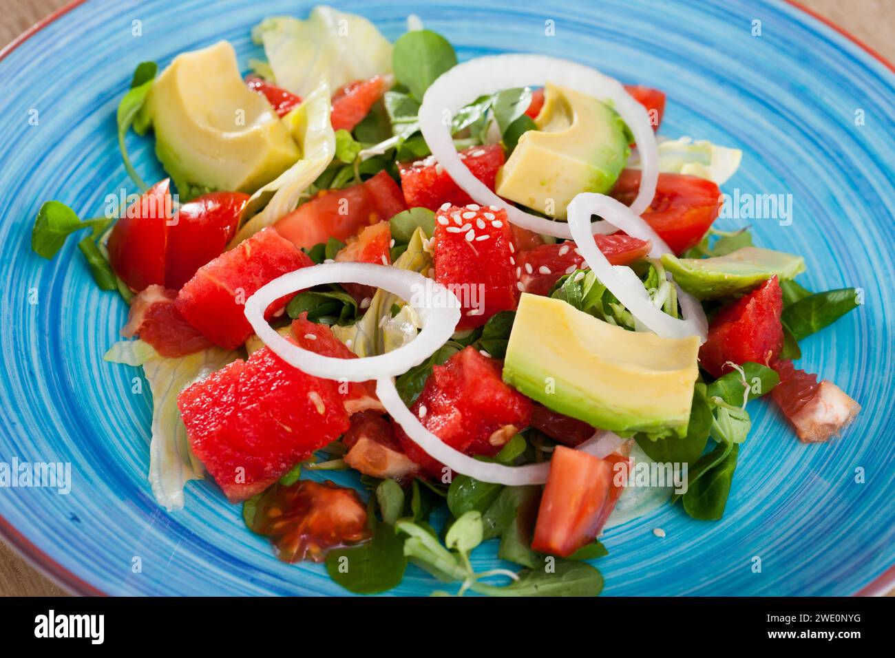 Salad with watermelon, avocado, grapefruit Stock Photo - Alamy
