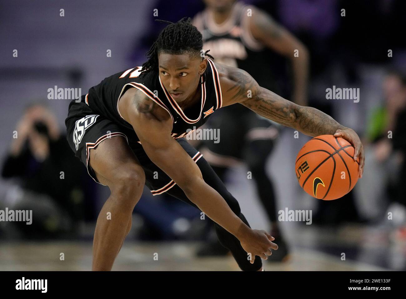 Oklahoma State guard Javon Small drives during the second half of an ...
