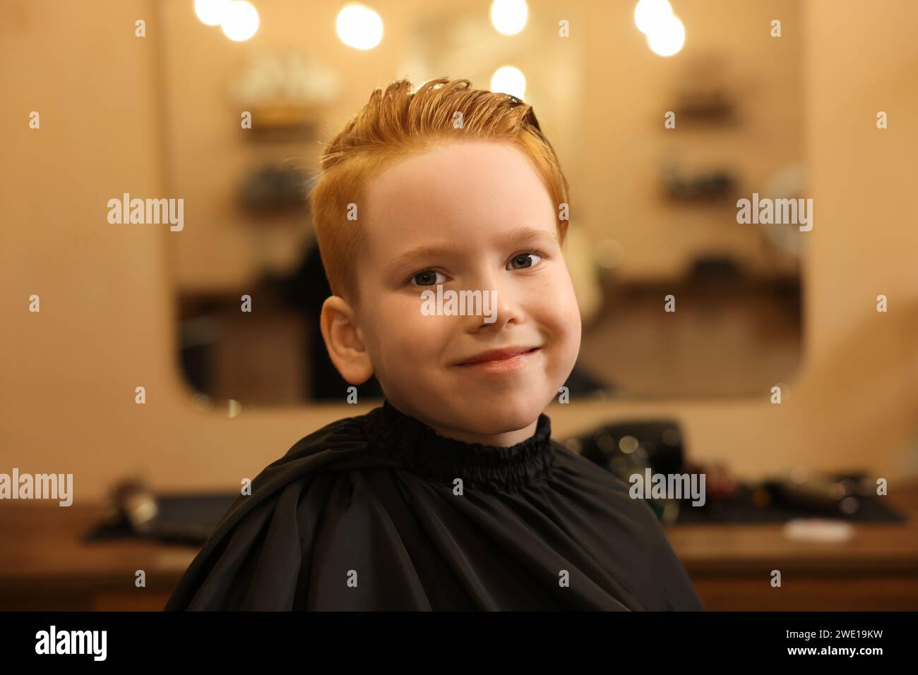 Little boy with hairstyle in beauty salon Stock Photo - Alamy