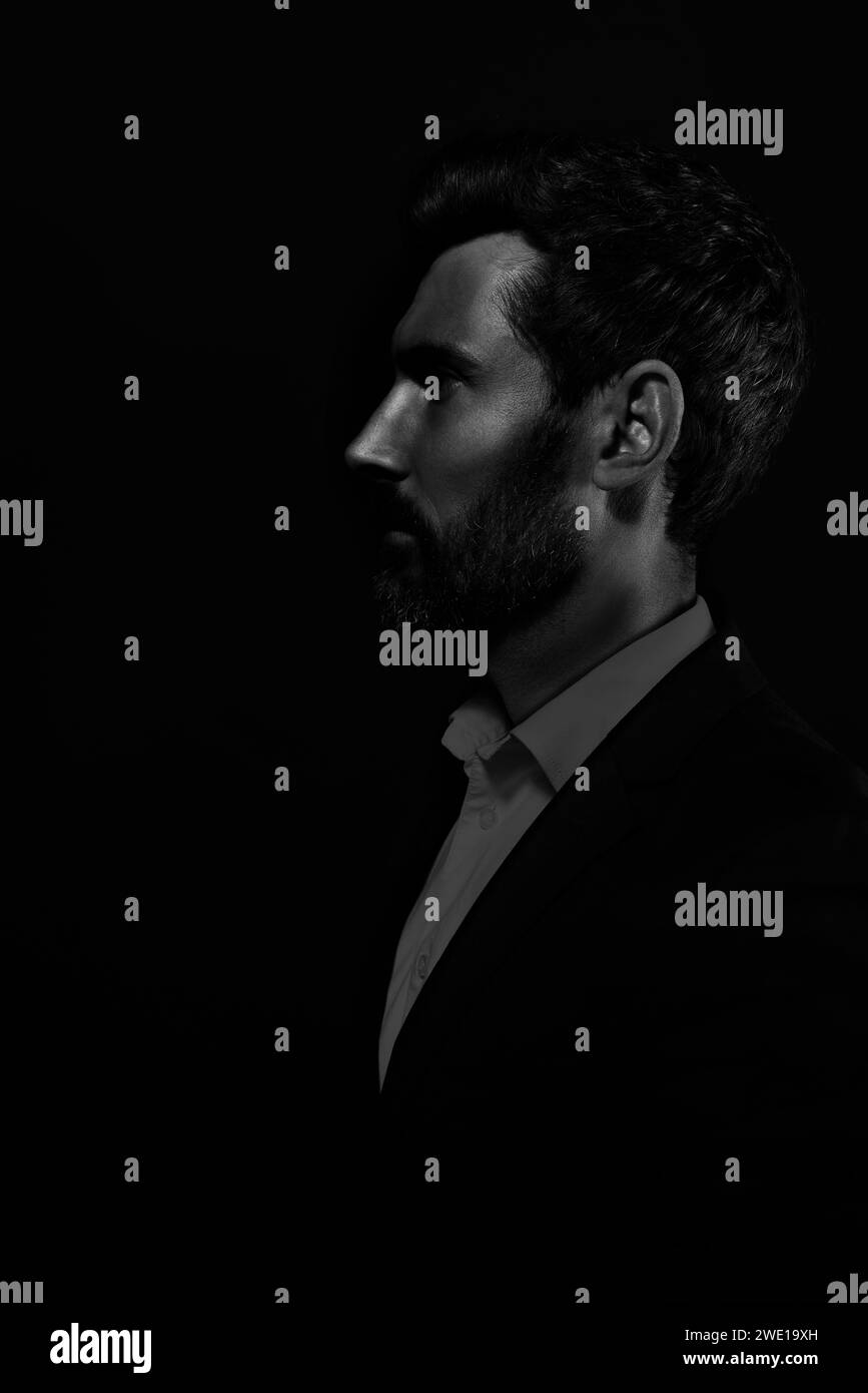 Silhouette of man in darkness. Portrait on black background Stock Photo ...