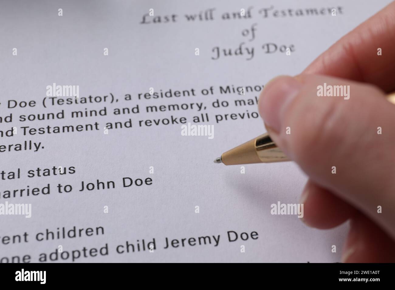 Old woman signing agreement hi-res stock photography and images - Alamy