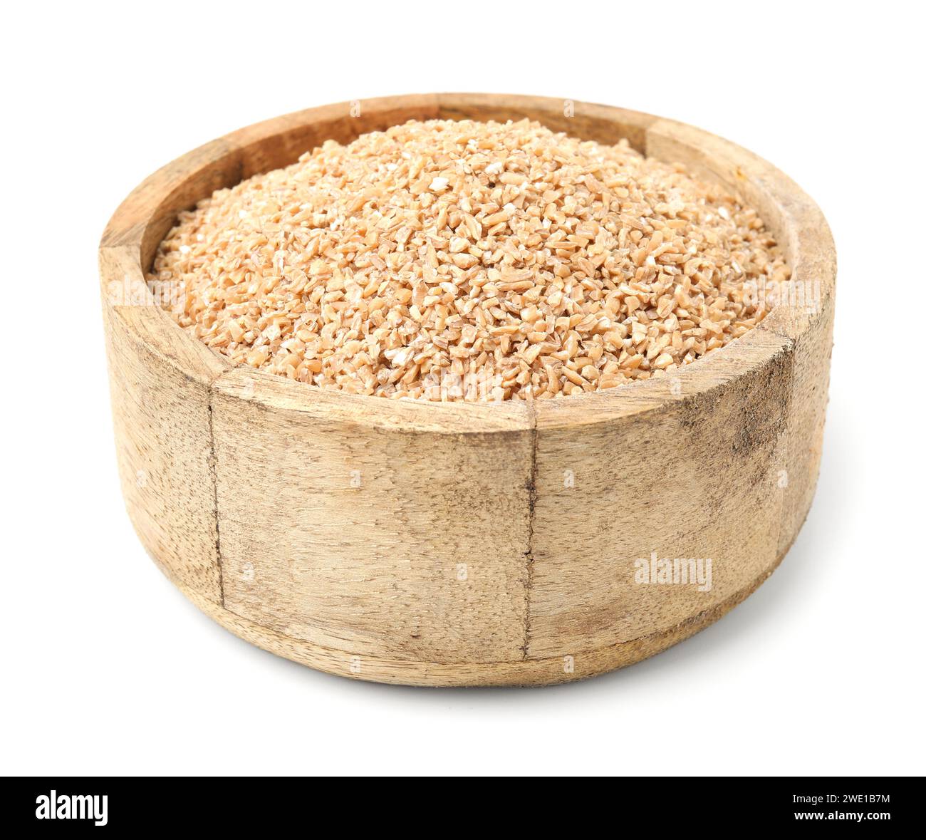 Dry wheat groats in bowl isolated on white Stock Photo - Alamy
