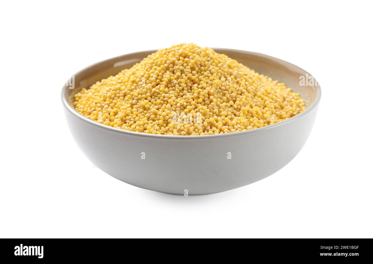 Dry millet seeds in bowl isolated on white Stock Photo - Alamy