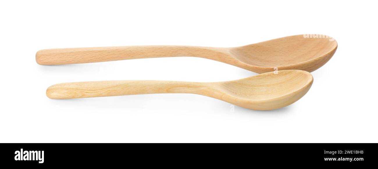Two empty wooden spoons isolated on white Stock Photo - Alamy