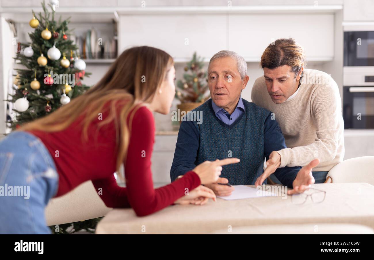 Family members discussing inheritance Stock Photo - Alamy