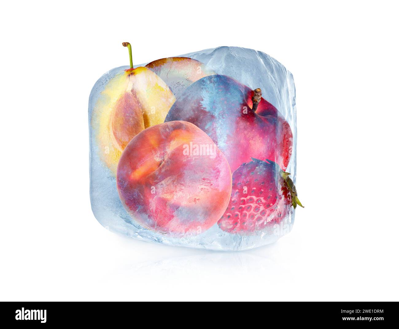 Frozen food. Raw fruits in ice cube isolated on white Stock Photo - Alamy