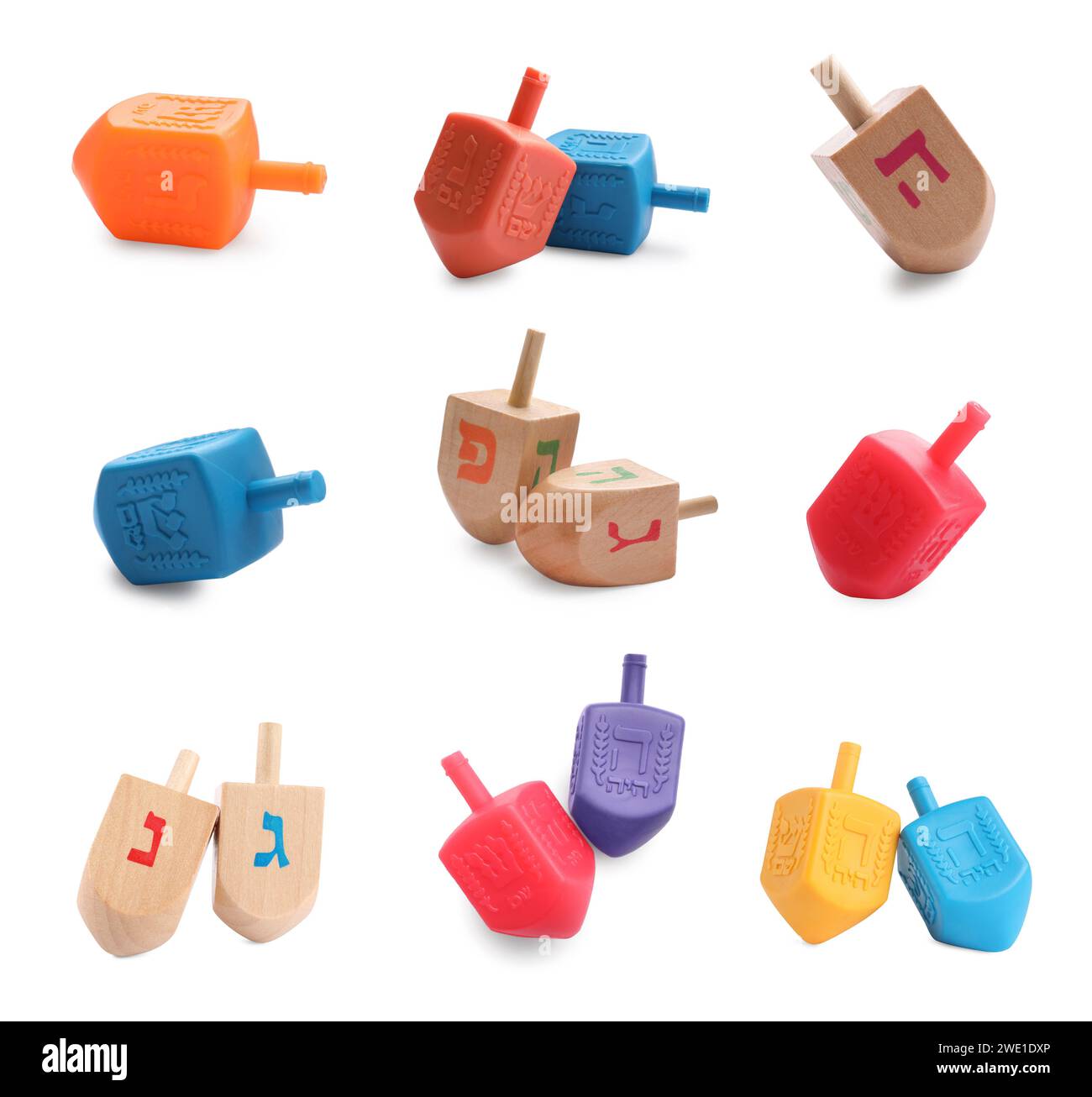 Hanukkah celebration. Different dreidels with jewish letters isolated ...