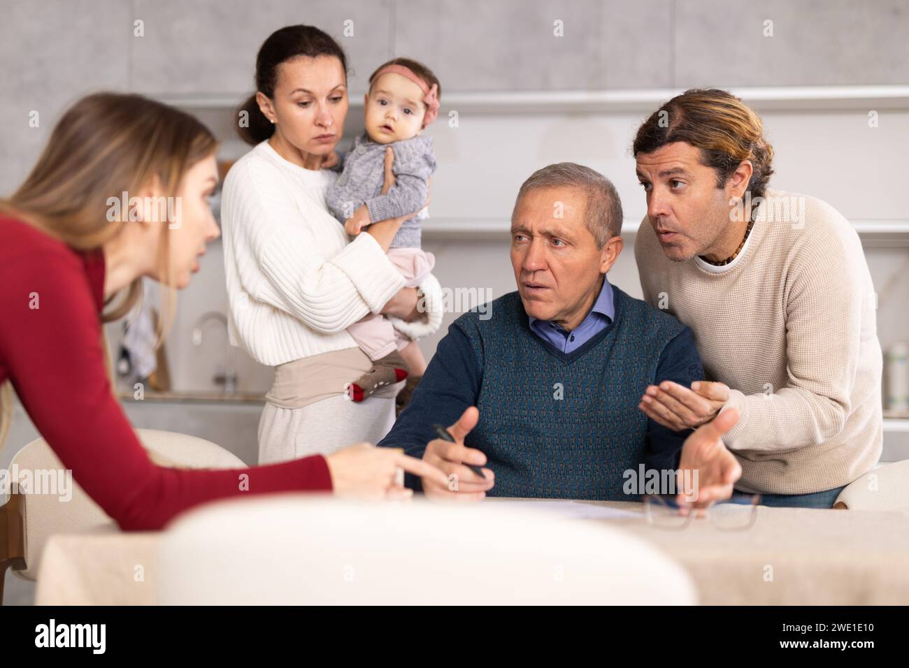 Family members discussing inheritance Stock Photo - Alamy