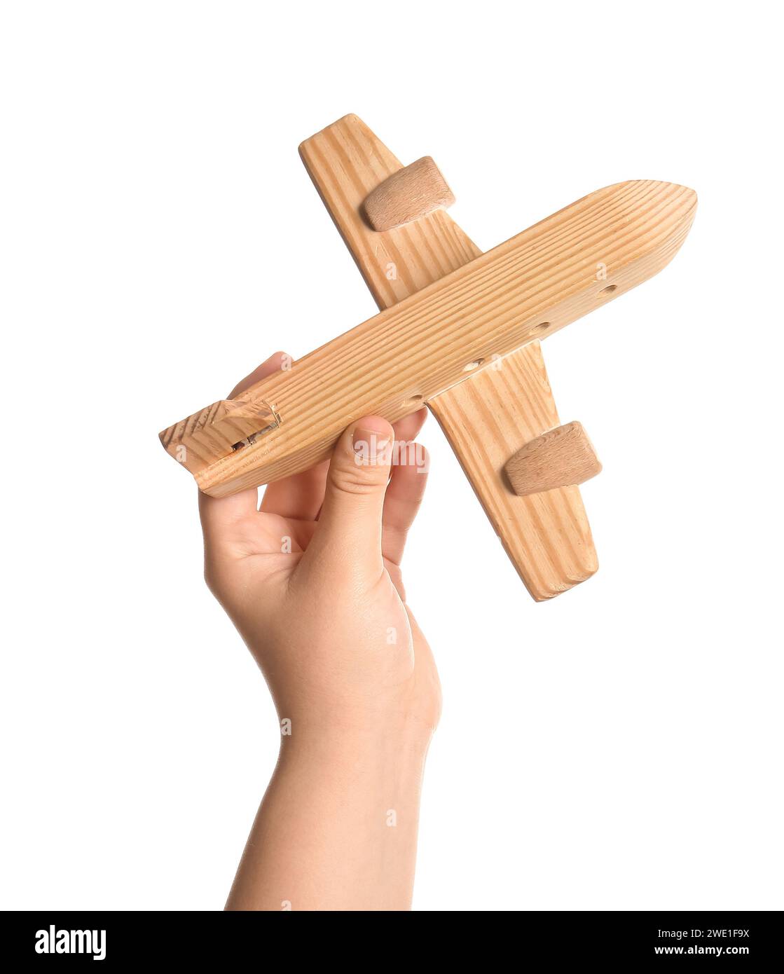 Female hand with wooden plane on white background, closeup Stock Photo ...