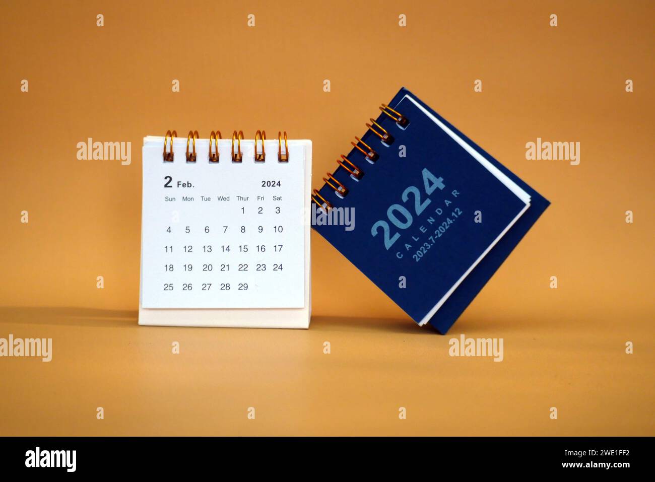 Desk calendar for February 2024 on a gold background copy space Stock ...