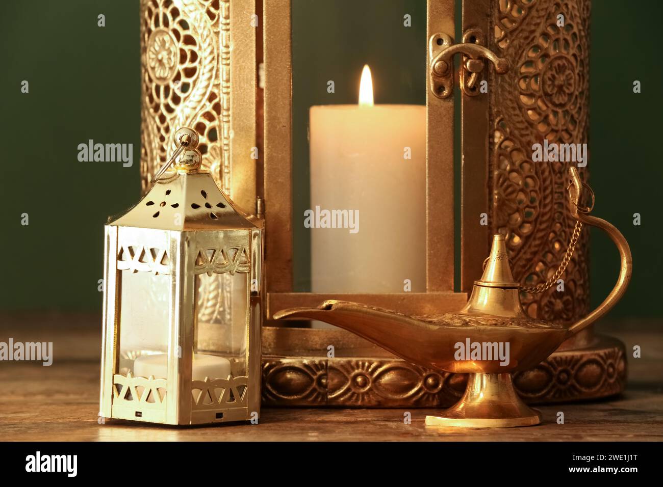Muslim lanterns with burning cnadles and Aladdin lamp for Ramadan on ...