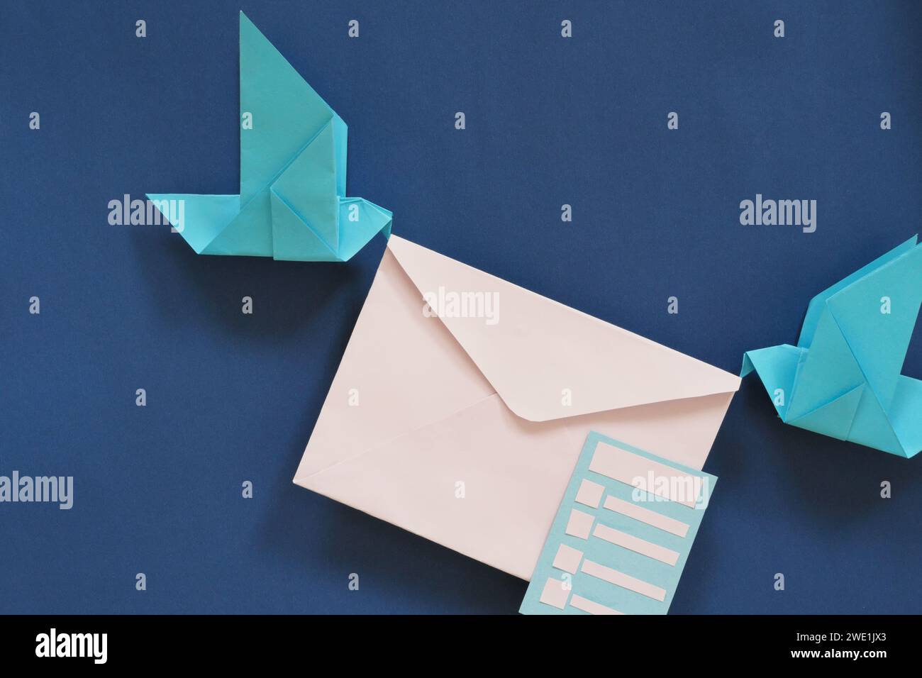 Two birds paper origami carrying letter envelope. Receiving email or ...